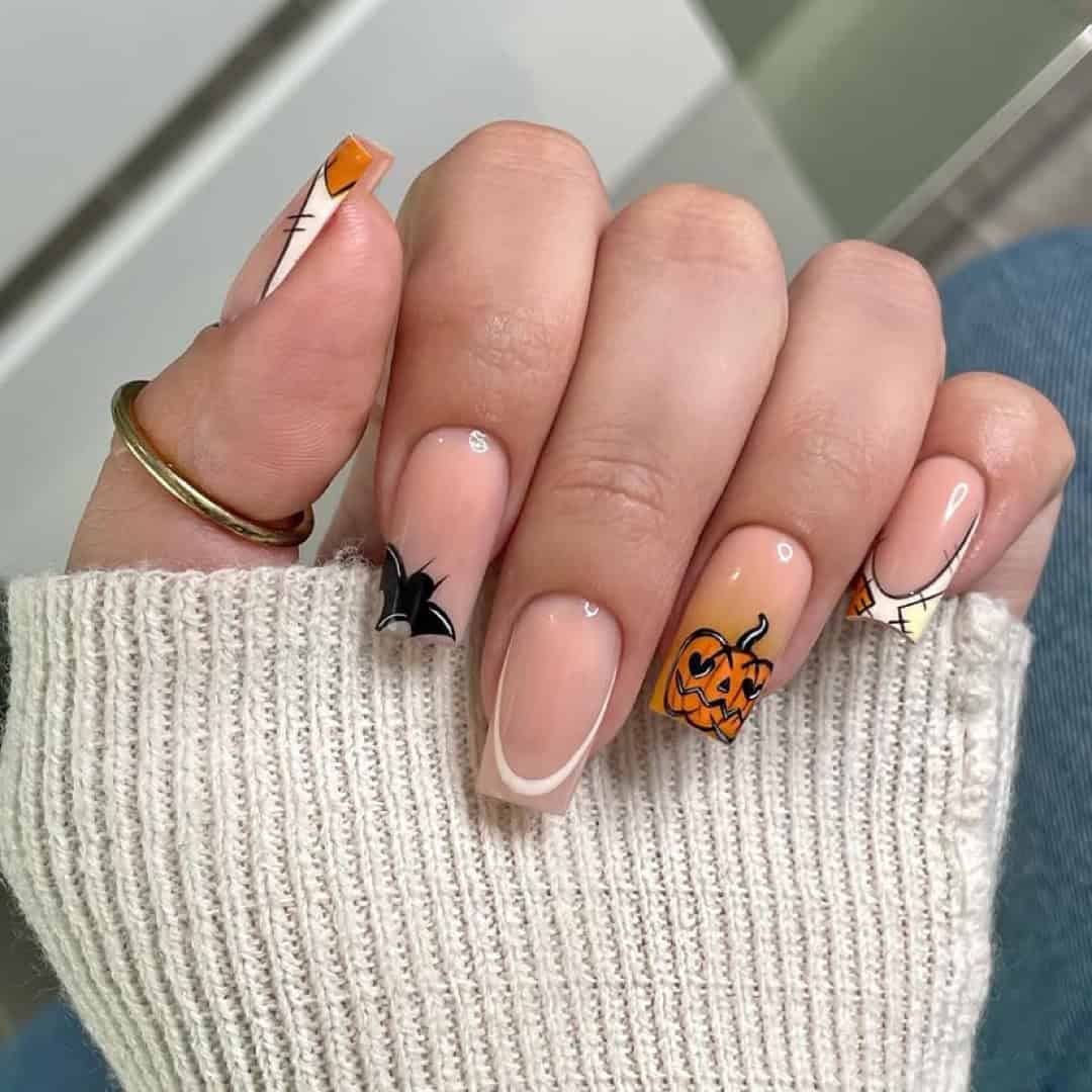 40 SPOOKY AND CUTE HALLOWEEN NAIL DESIGNS - Stylin by Sarita